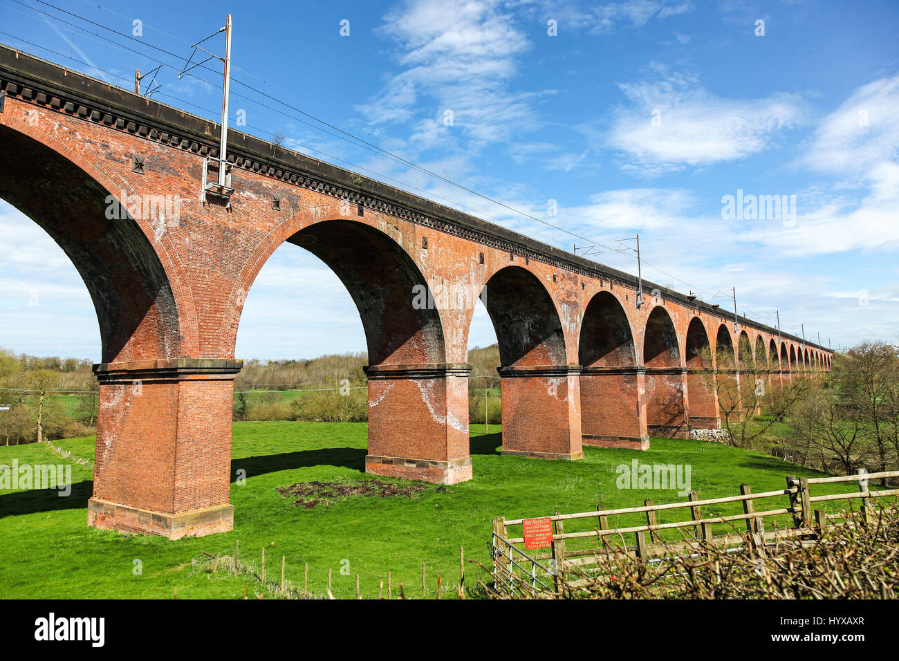 The red brick and sandstone Twemlow viaduct, Holmes Chapel which ...