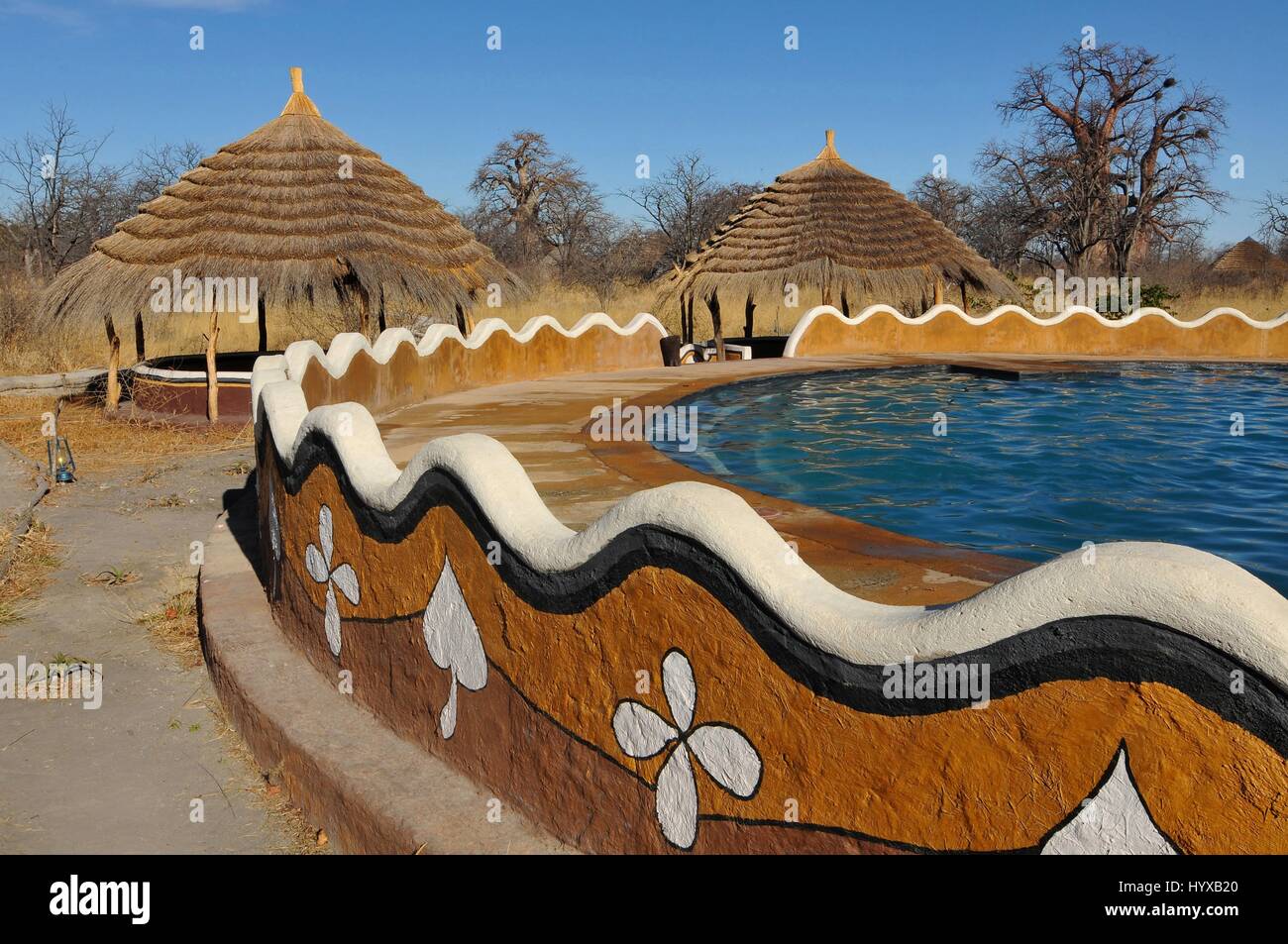 Africa, Botswana, swimming pool and hut Stock Photo - Alamy