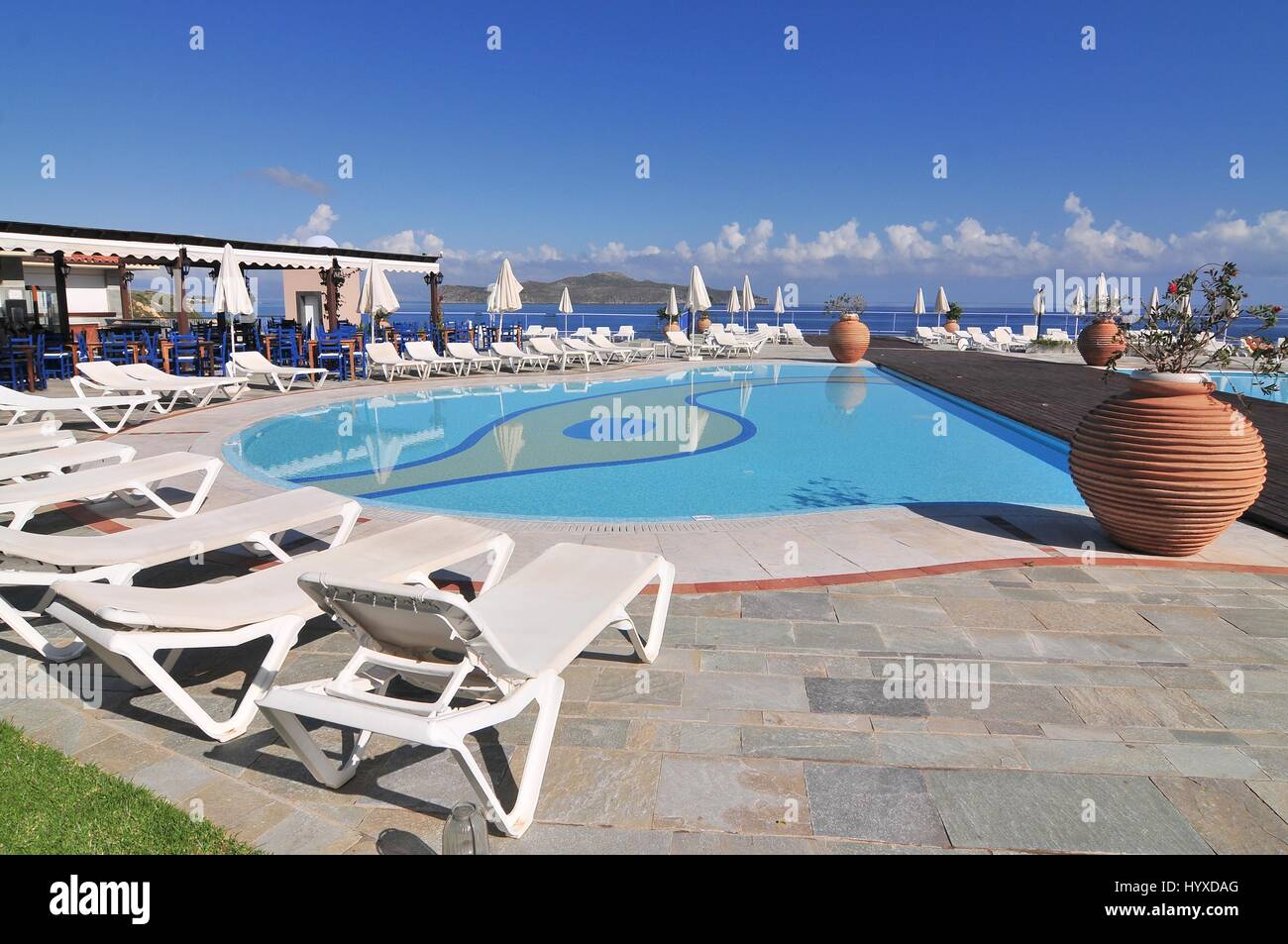 Luxury exclusive infinity pool inviting a dip, overlooking Crete and ...