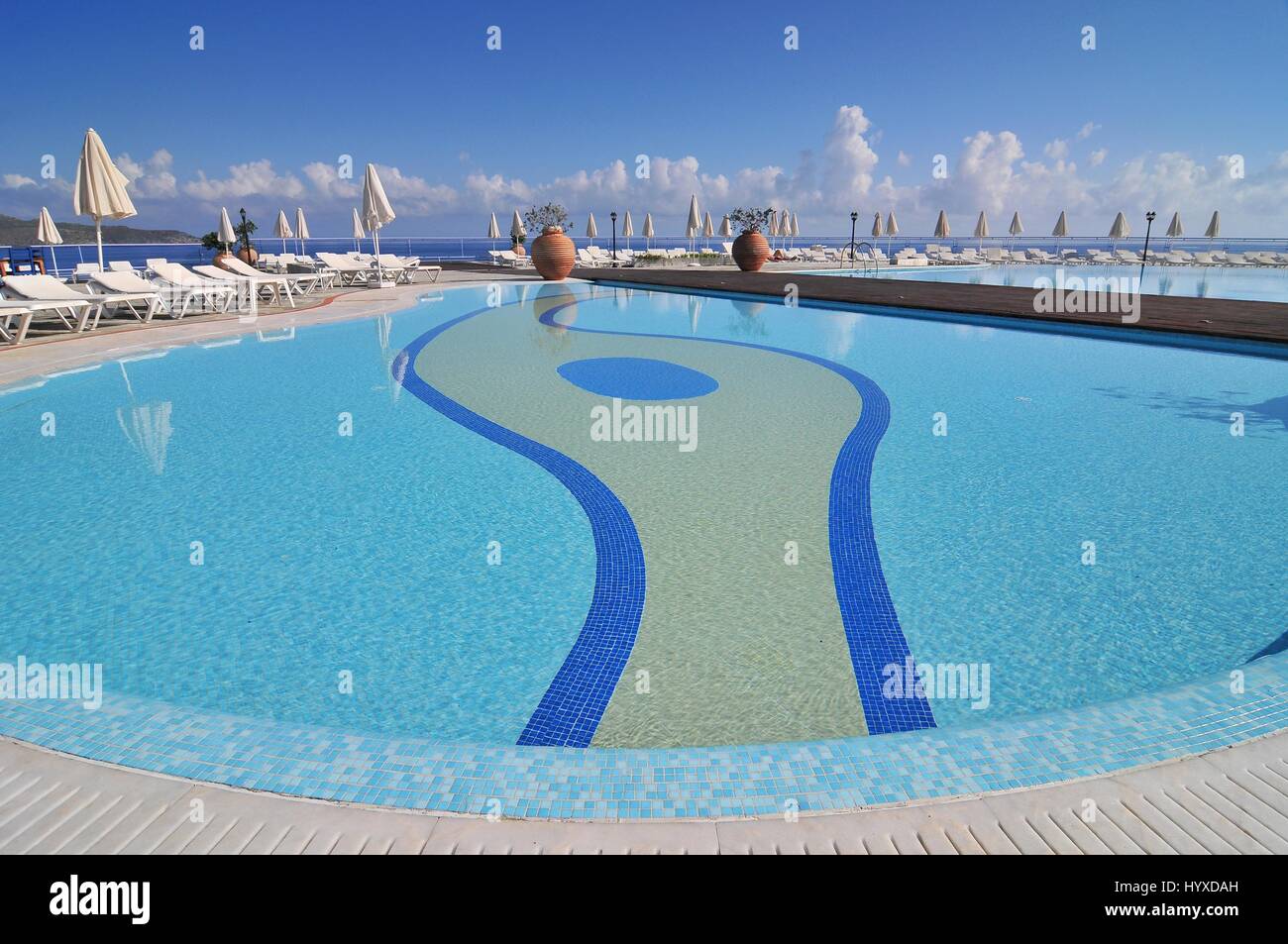 Luxury exclusive infinity pool inviting a dip, overlooking Crete and ...