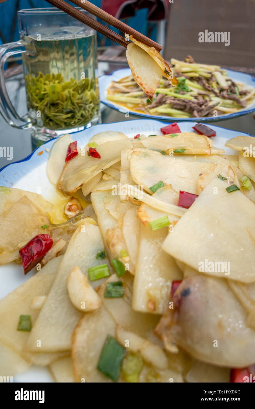 A local traditional meal of yak meat, celery and potato meal with fresh ...