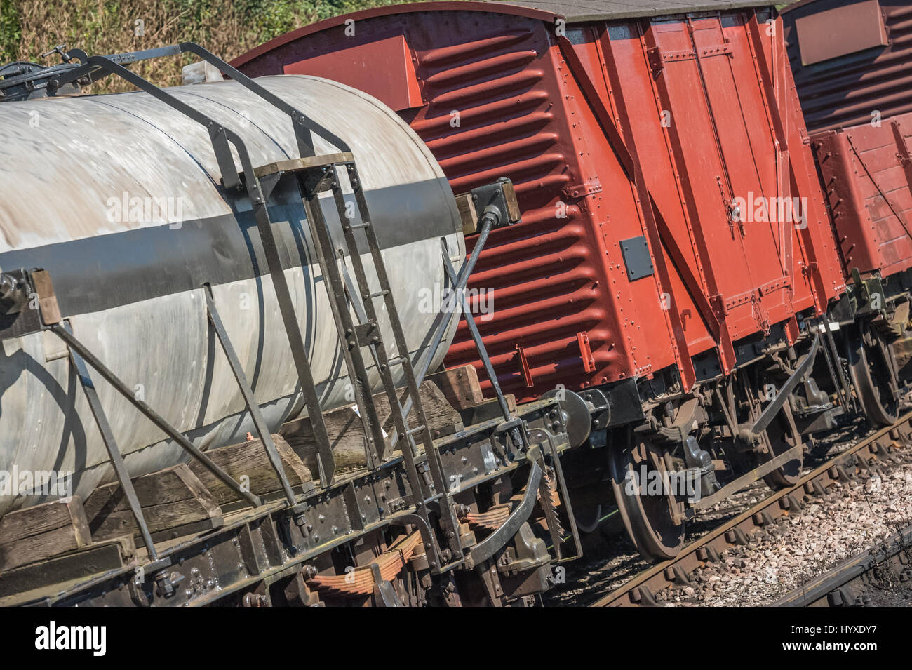 closeup of freight wagons on a railroad track Stock Photo - Alamy