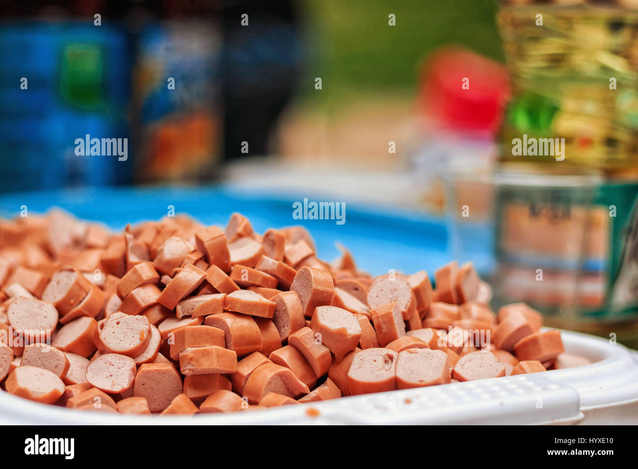 Sliced wiener on a white plastic plate Stock Photo - Alamy