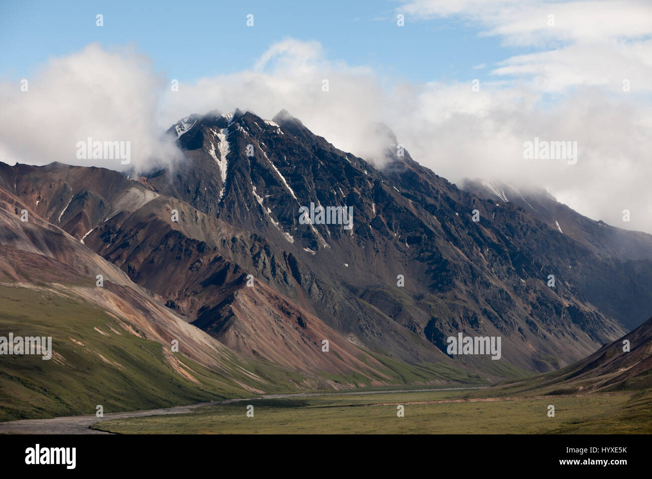 Clouds cover the dramatic landscape in Denali National Park and ...