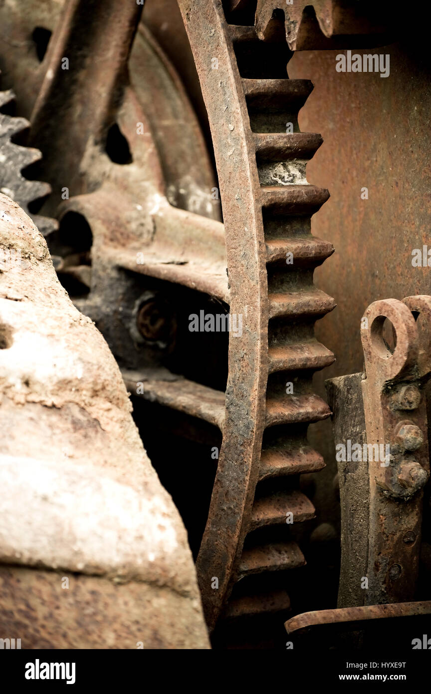 rusting old industrial machine cog wheel background Stock Photo - Alamy