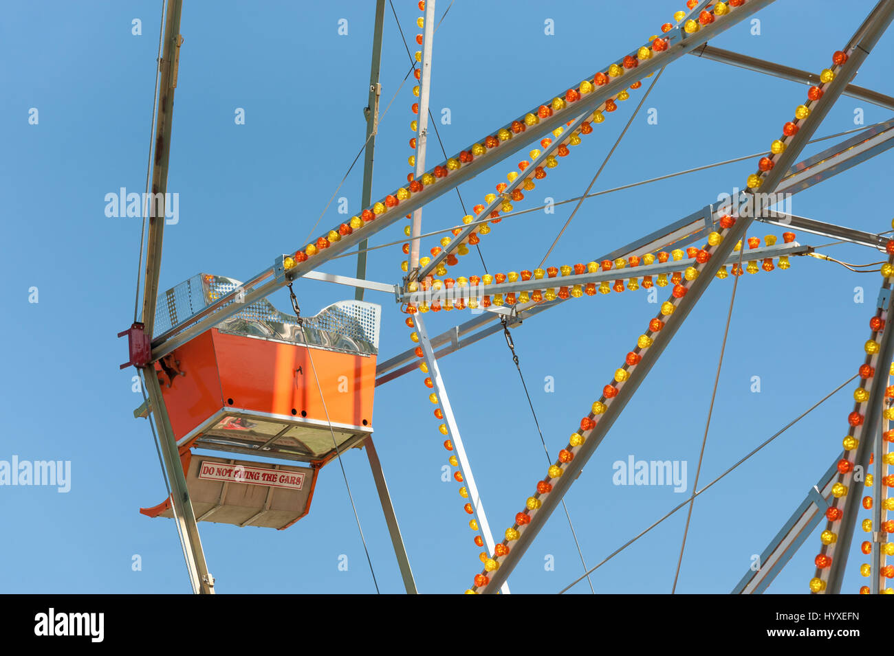 warning sign on a vintage ferris wheel gondola car Stock Photo - Alamy
