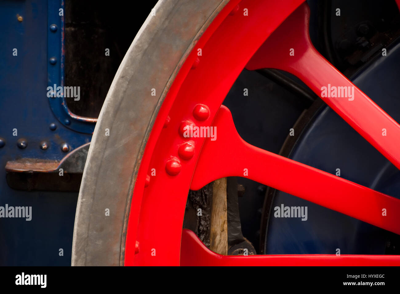 colorful vintage steam traction engine wheel detail Stock Photo - Alamy