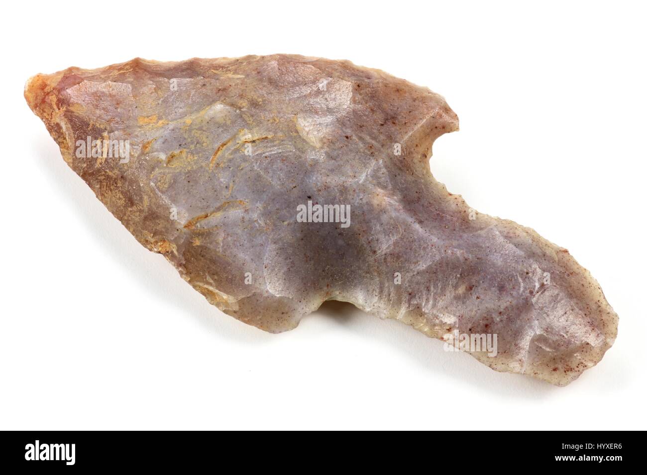 neolithic arrowhead isolated on white background Stock Photo - Alamy