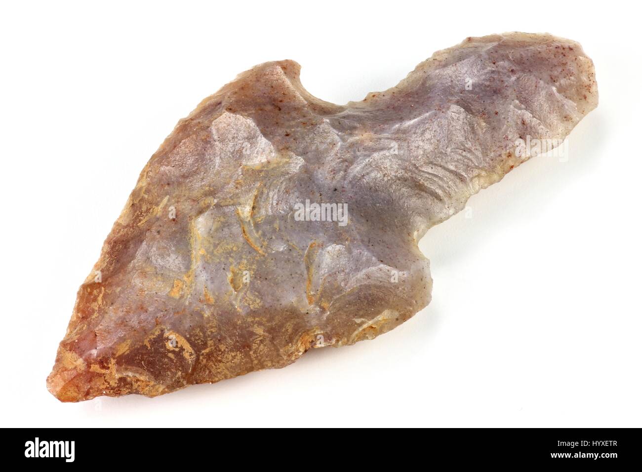 neolithic arrowhead isolated on white background Stock Photo - Alamy