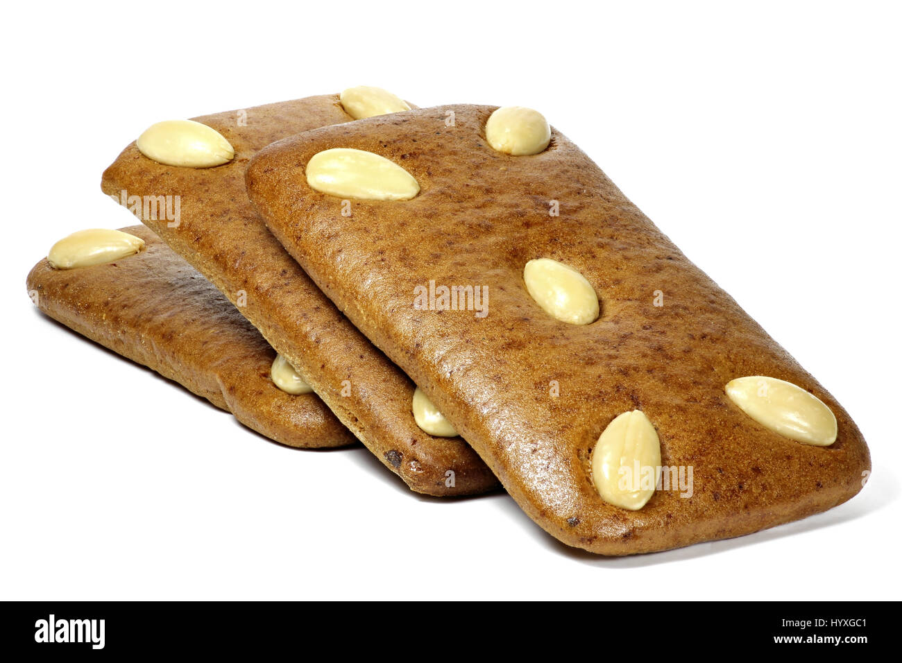 gingerbread with almonds isolated on white background Stock Photo - Alamy