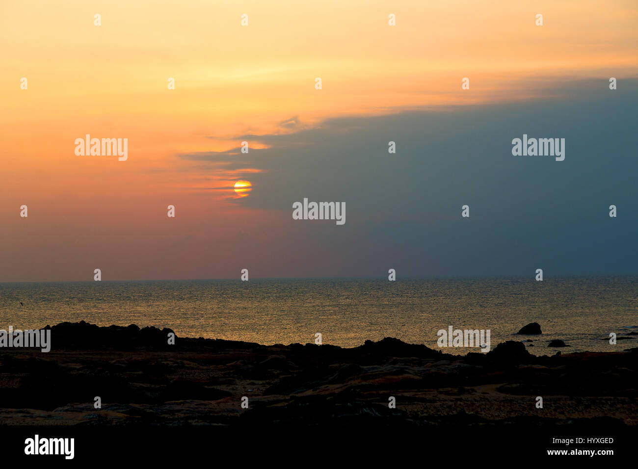 the blurred sun falling down arabian sea ocean in oman coastline Stock ...