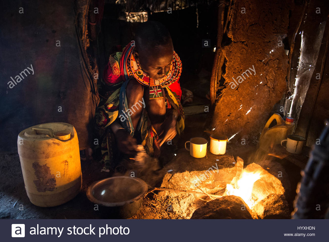 Woman Cooking Over Open Fire Stock Photos & Woman Cooking Over Open ...