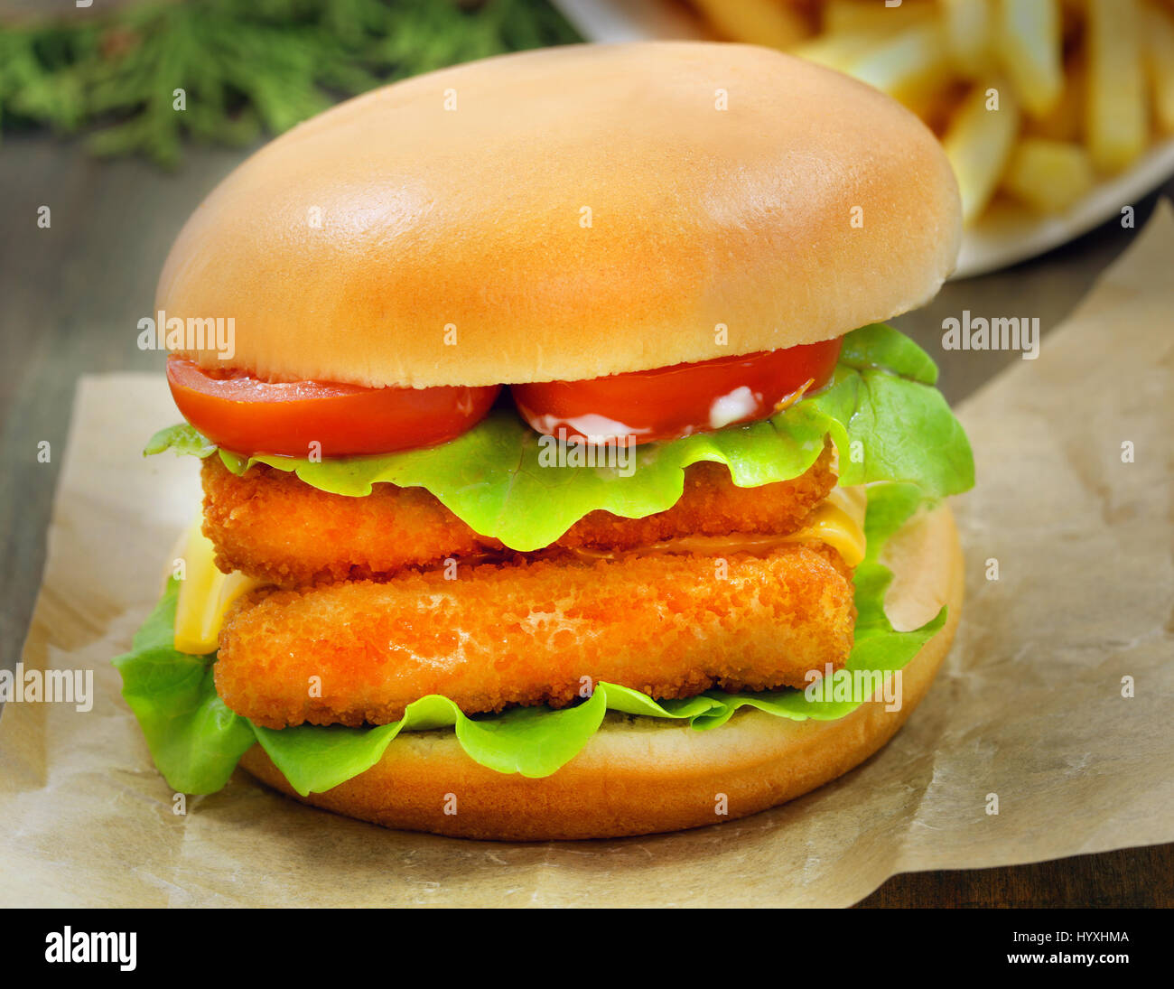 Photo of a delicious fresh burger with fish on a beautiful background ...