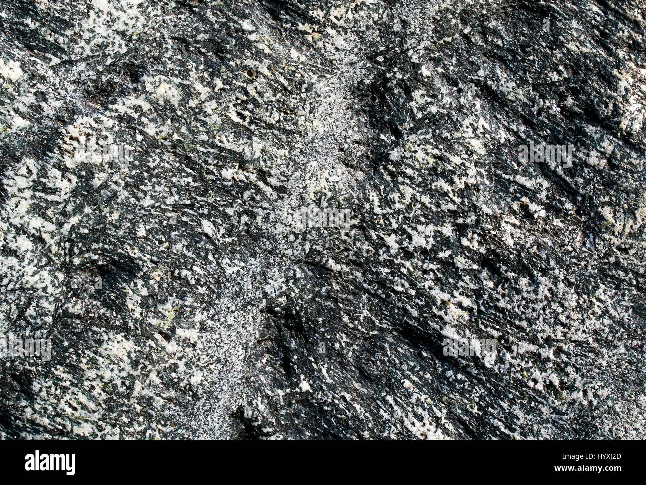 natural background with texture of the stone with different colored ...