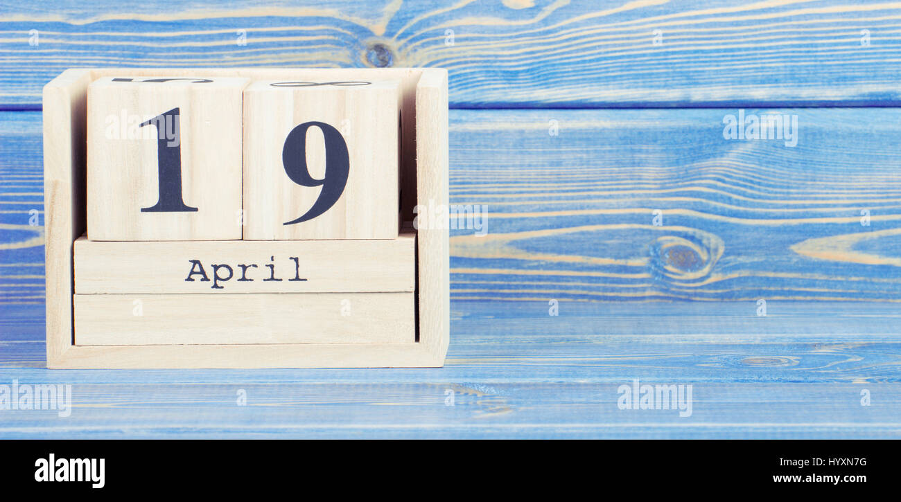 Vintage photo, April 19th. Date of 19 April on wooden cube calendar ...