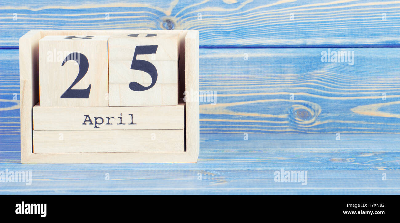 Vintage photo, April 25th. Date of 25 April on wooden cube calendar ...