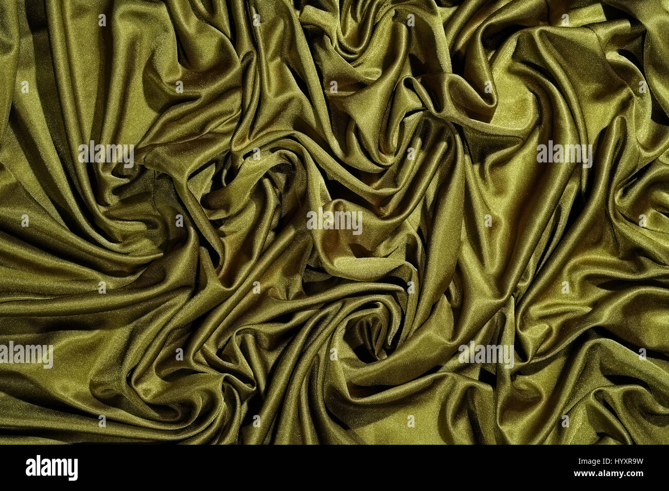 Cloth background in golden color Stock Photo - Alamy