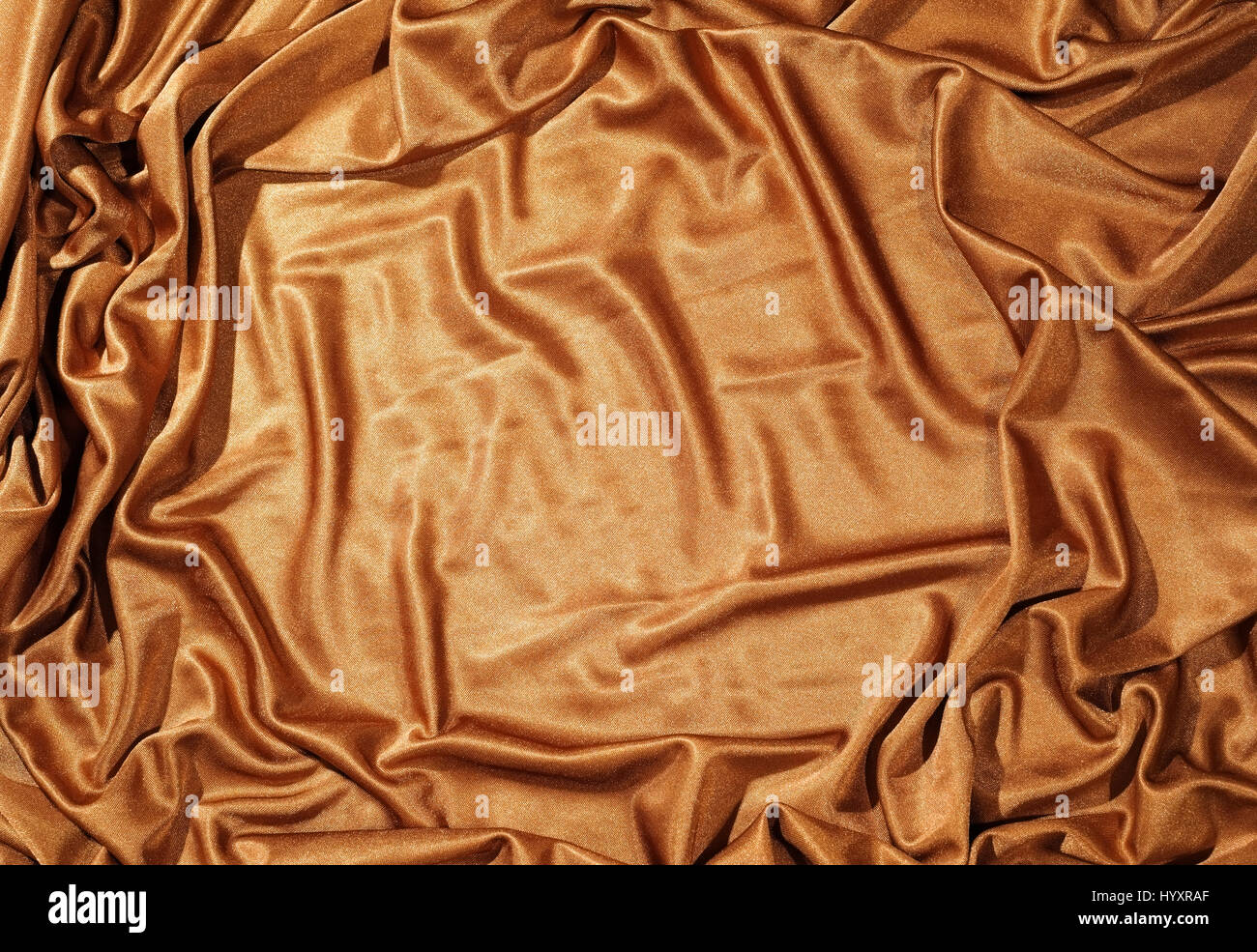 Cloth background in golden color Stock Photo - Alamy