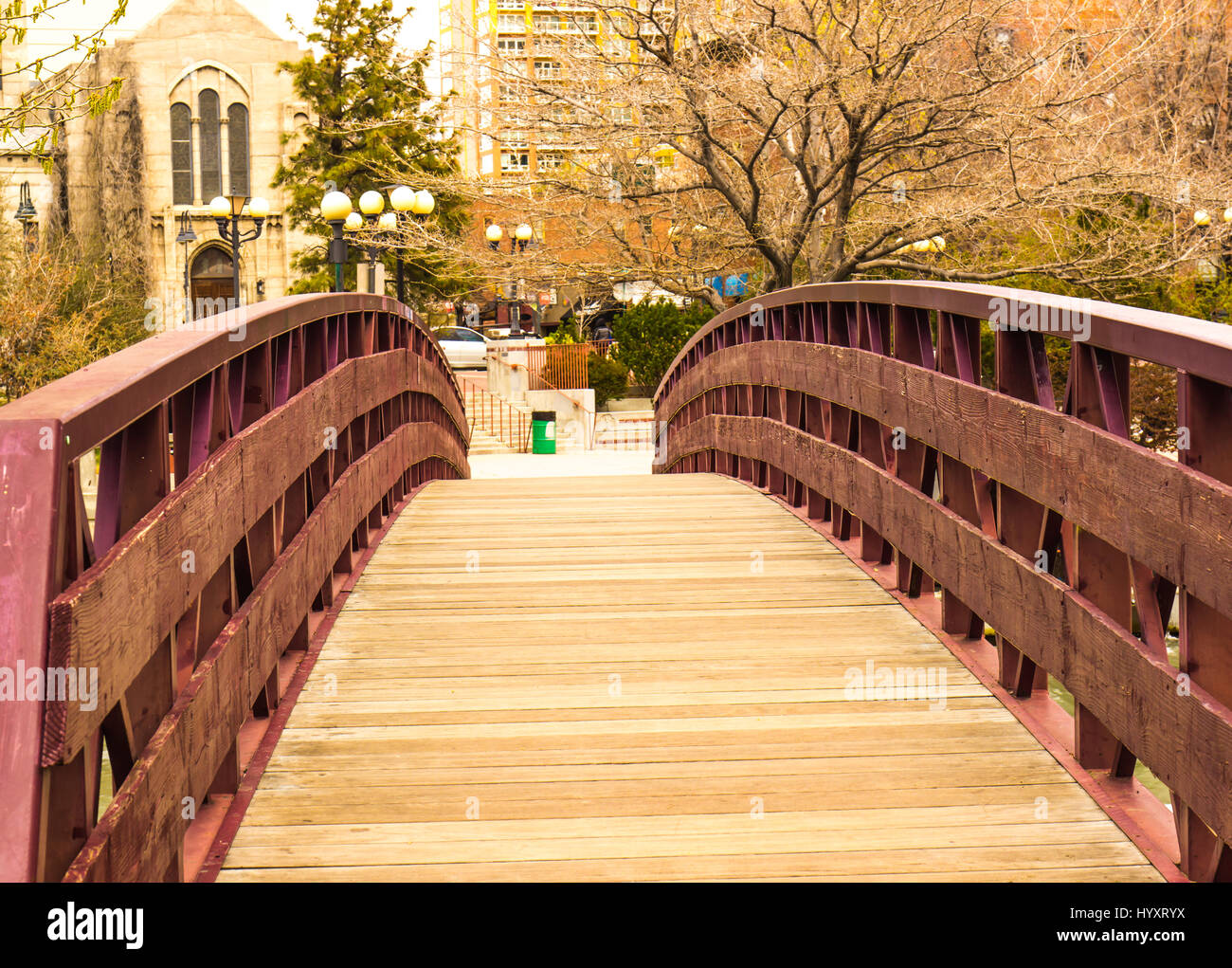Wooden Foot Bridge Across River Stock Photo - Alamy
