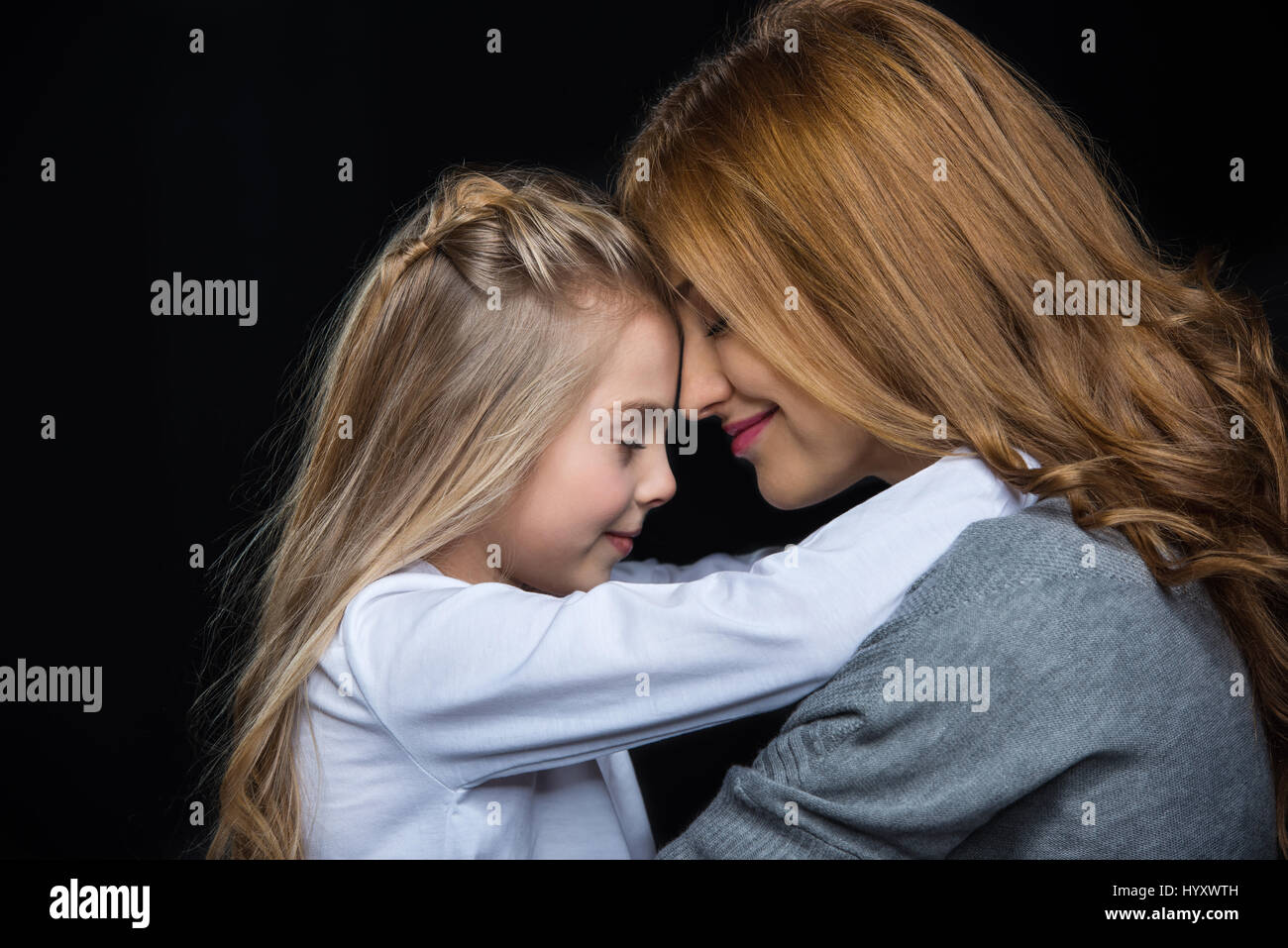 Two people foreheads touching hi-res stock photography and images - Alamy