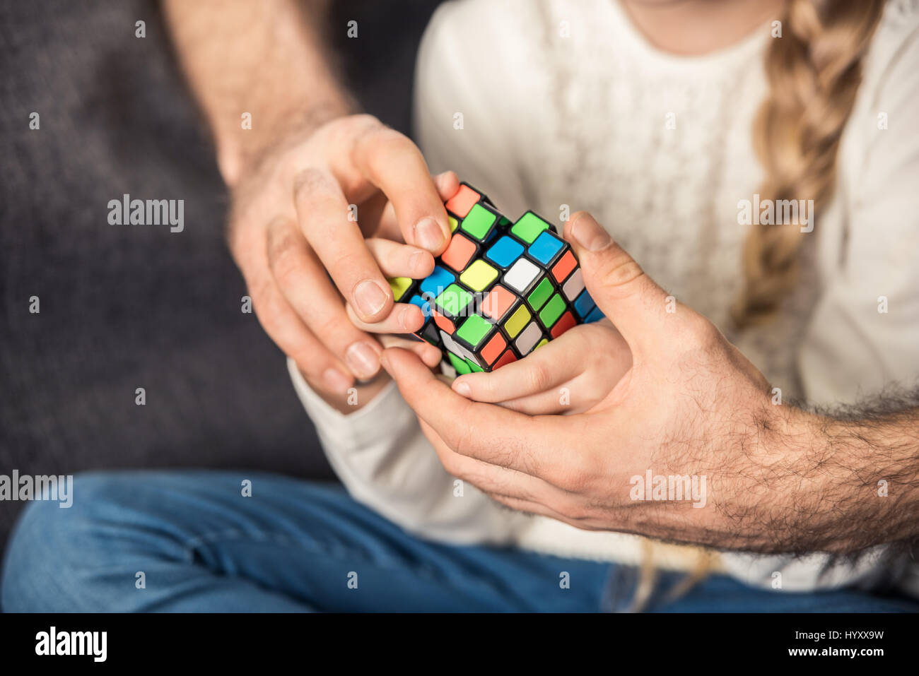 Man with rubic cube hi-res stock photography and images - Alamy
