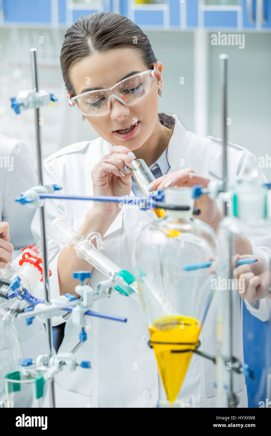 Scientist chemical goggles female hi-res stock photography and images ...