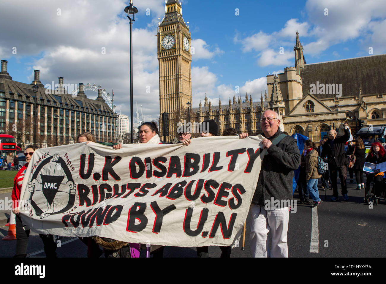 Disabled people protest cuts to benefits outside Parliament, London, UK ...