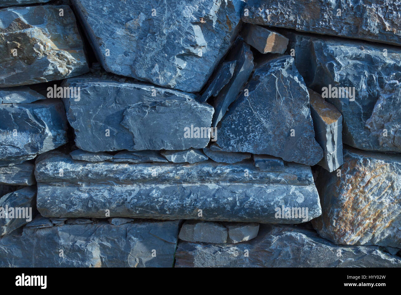 Abstract texture of a rustic vintage blue stone wall Stock Photo - Alamy