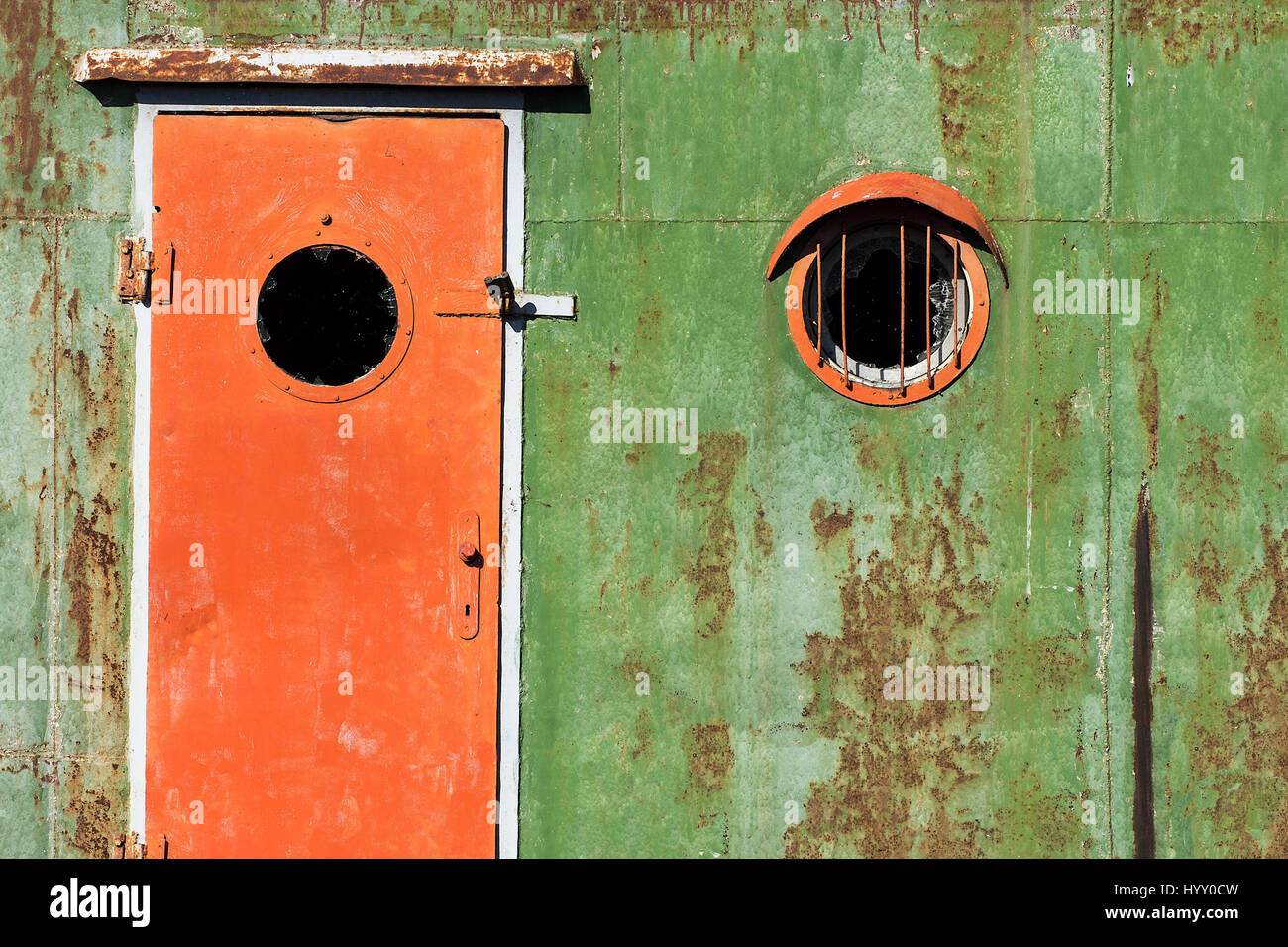 Old rusty door and window on an old ship Stock Photo - Alamy
