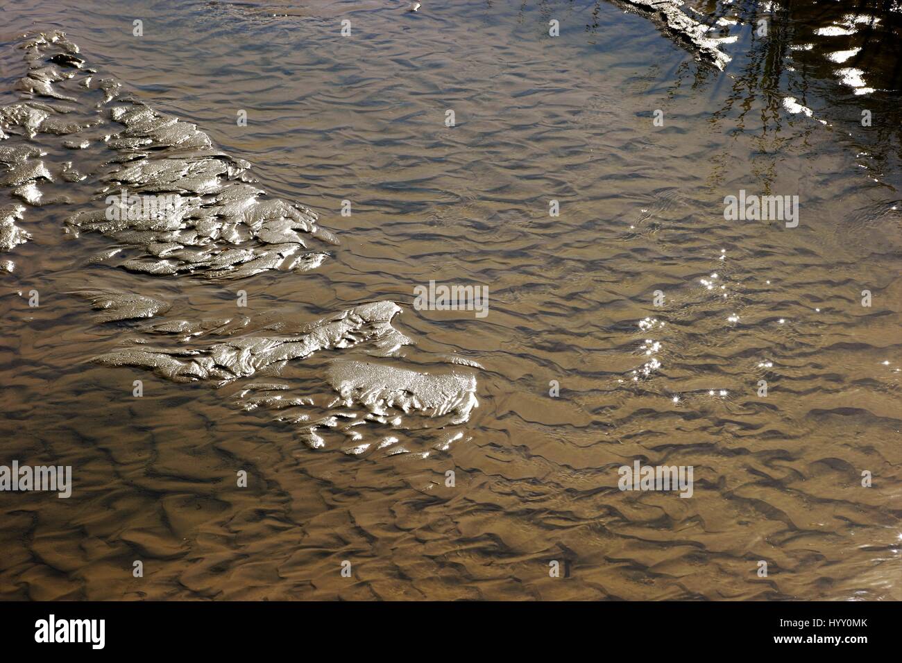 Water with spume in small lagoon Stock Photo - Alamy