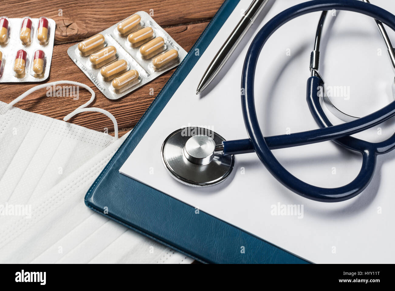 Desk of doctor with medicine things Stock Photo - Alamy