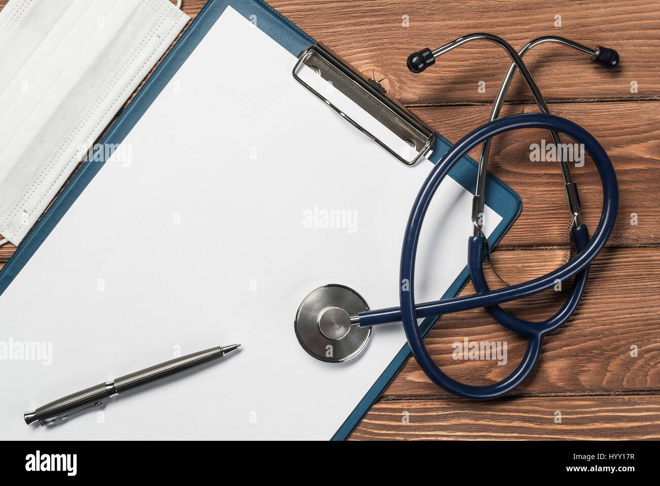 Desk of doctor with medicine things Stock Photo - Alamy