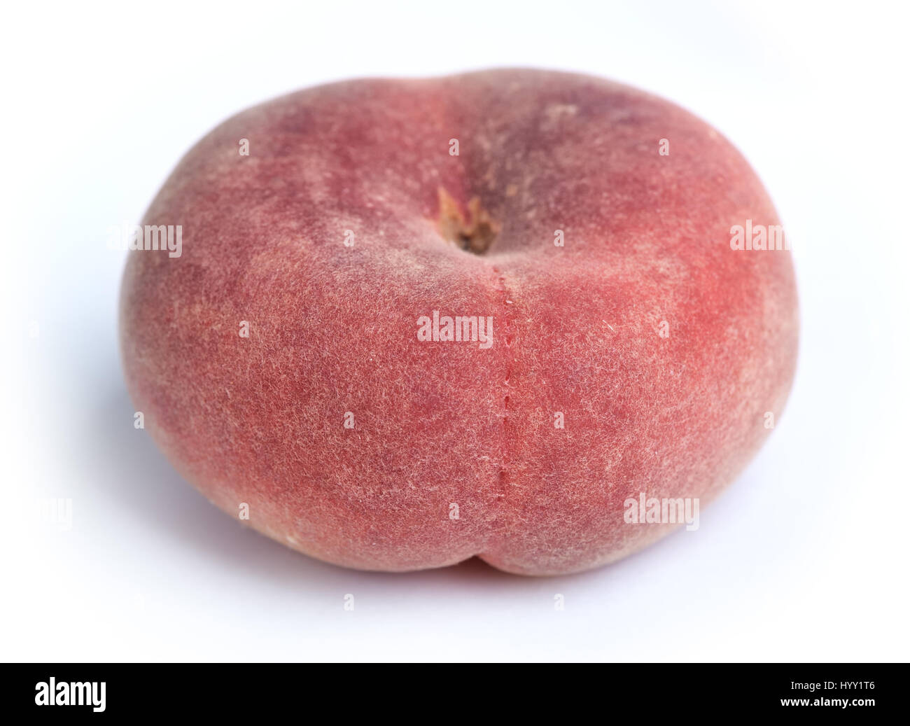 Flat nectarine isolated on white Stock Photo - Alamy