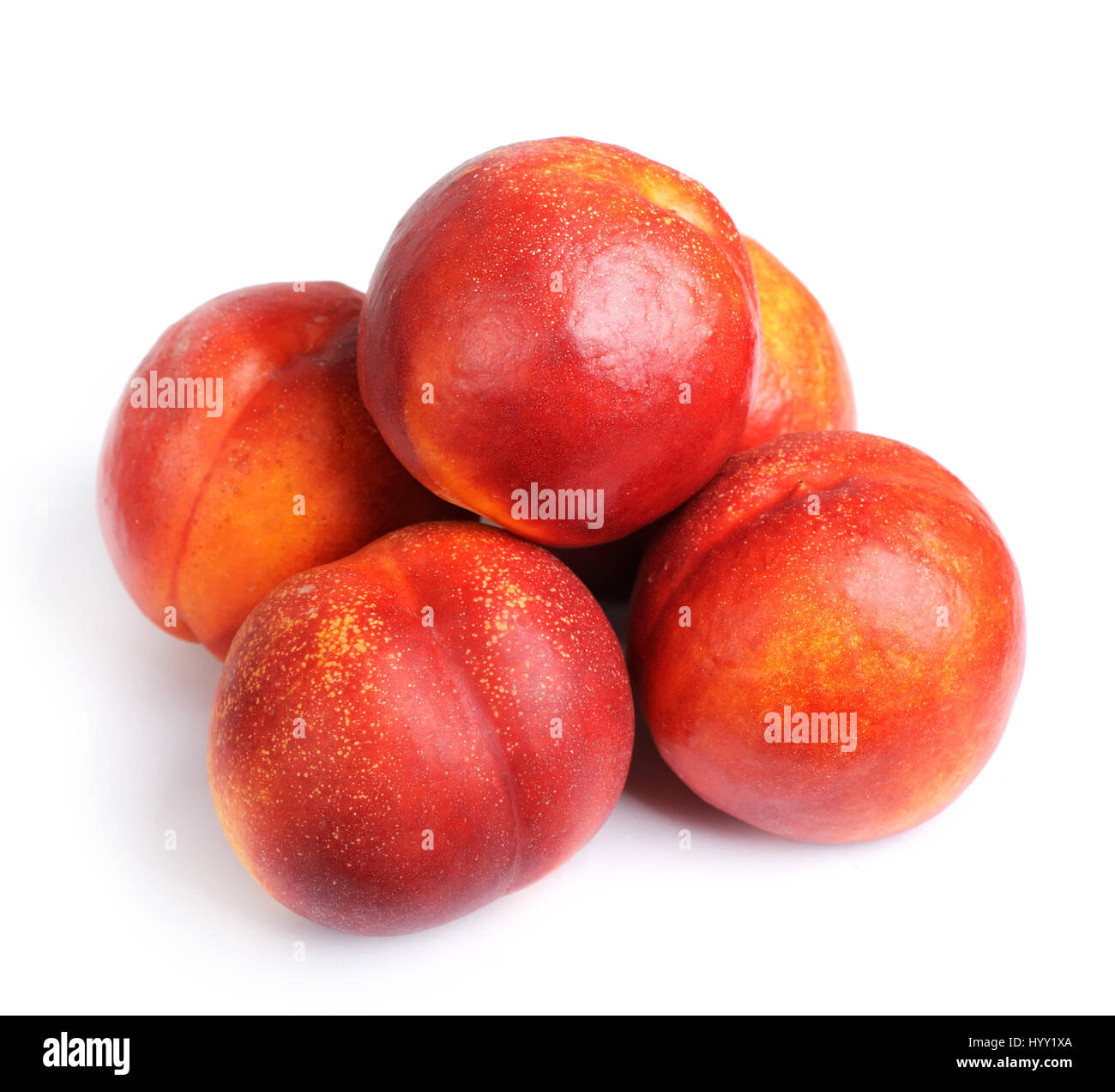 Nectarines isolated on a white background Stock Photo - Alamy