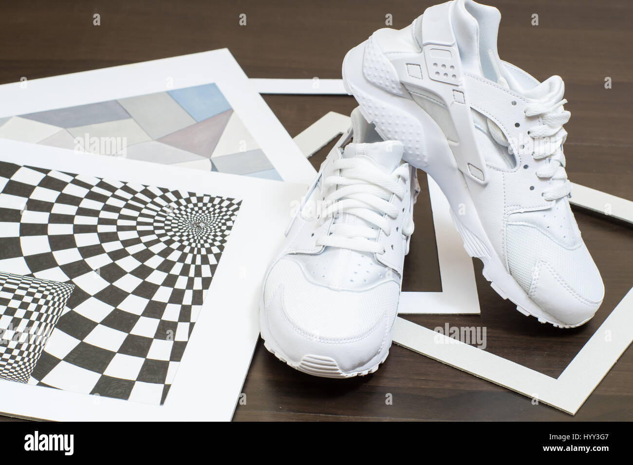 Modern sport shoes demonstrated in unique way with different objects ...