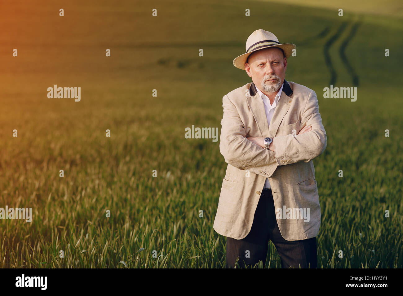 old man in field Stock Photo - Alamy