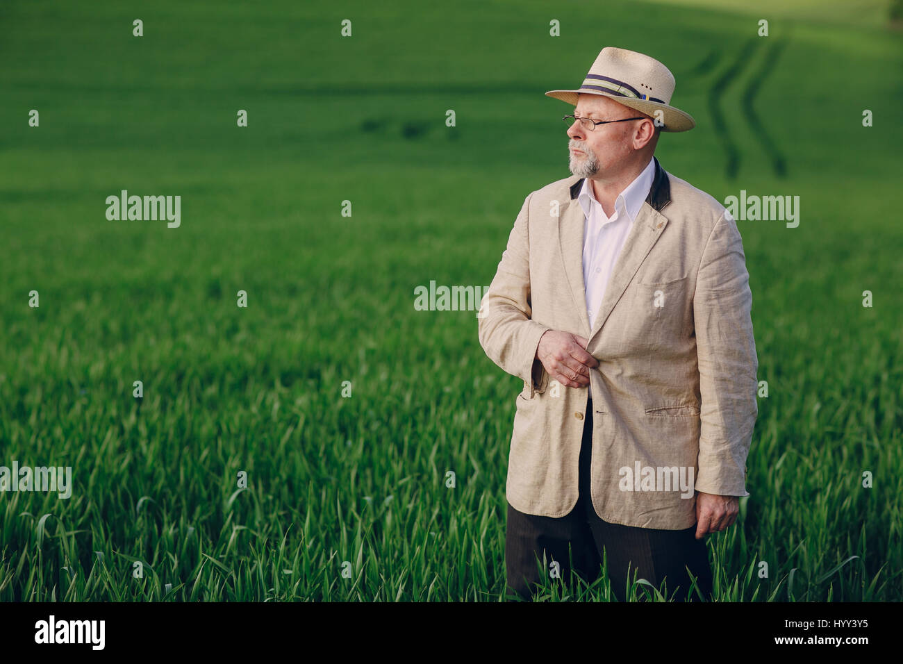 old man in field Stock Photo - Alamy
