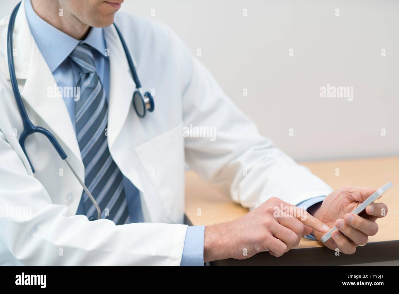 Hands doctor using smartphone close hi-res stock photography and images ...