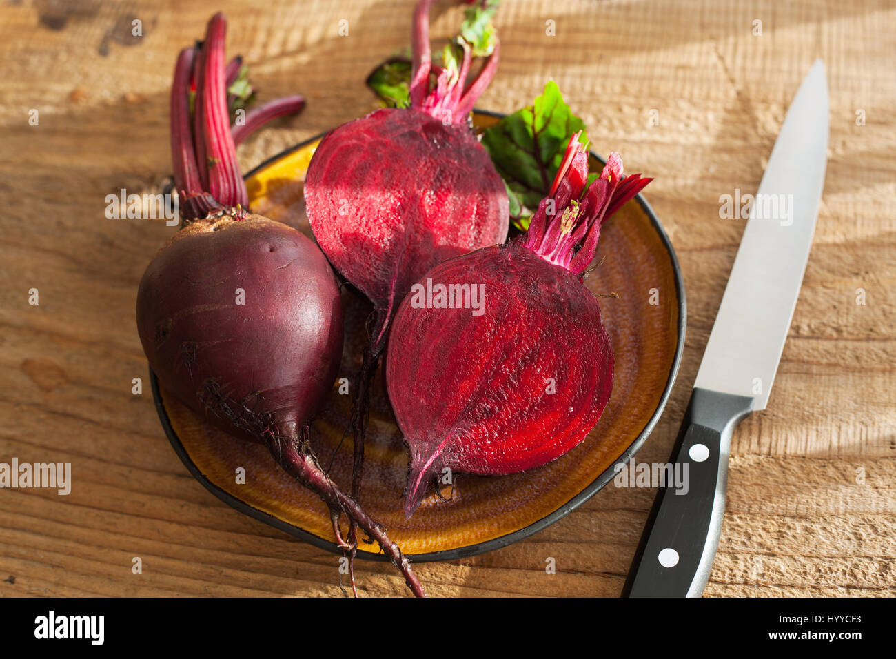 raw beetroot on wooden background Stock Photo - Alamy