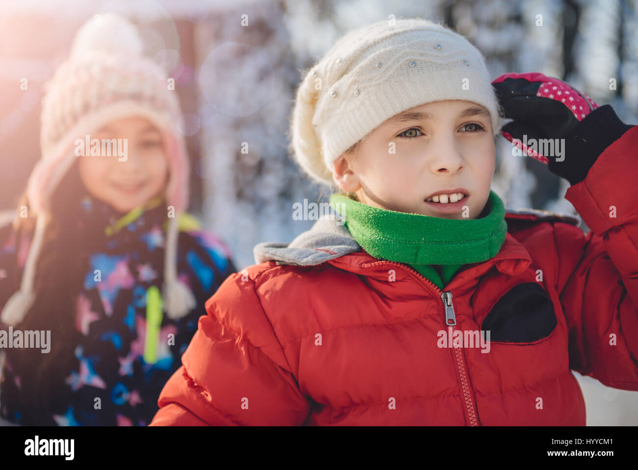 Child putting on jacket hi-res stock photography and images - Alamy