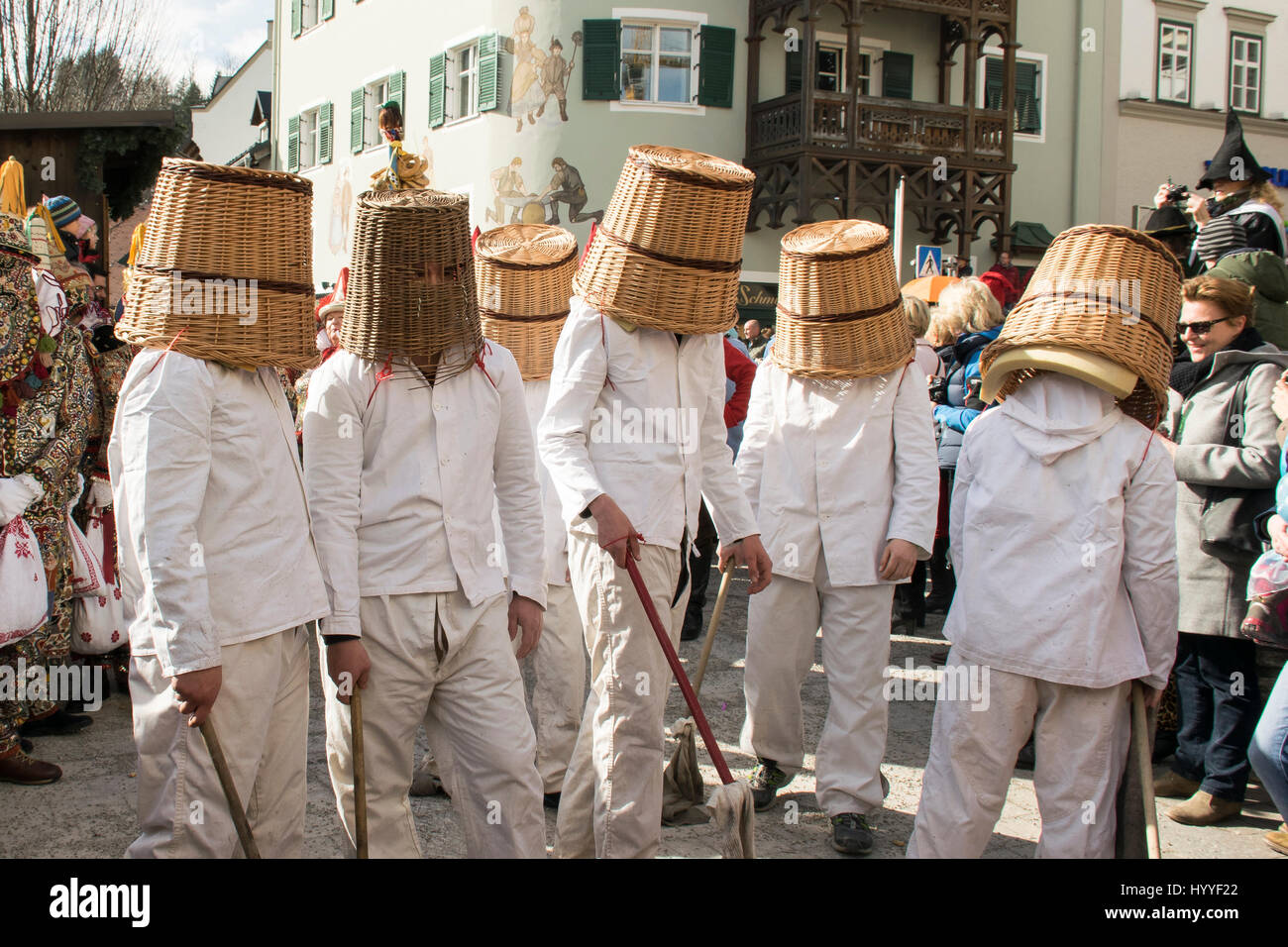 Aussee Carnival, men in white suits, even Pless, woven baskets on heads ...