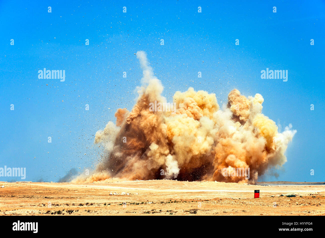 Rocks particle in the air after detonator blasting on the construction ...