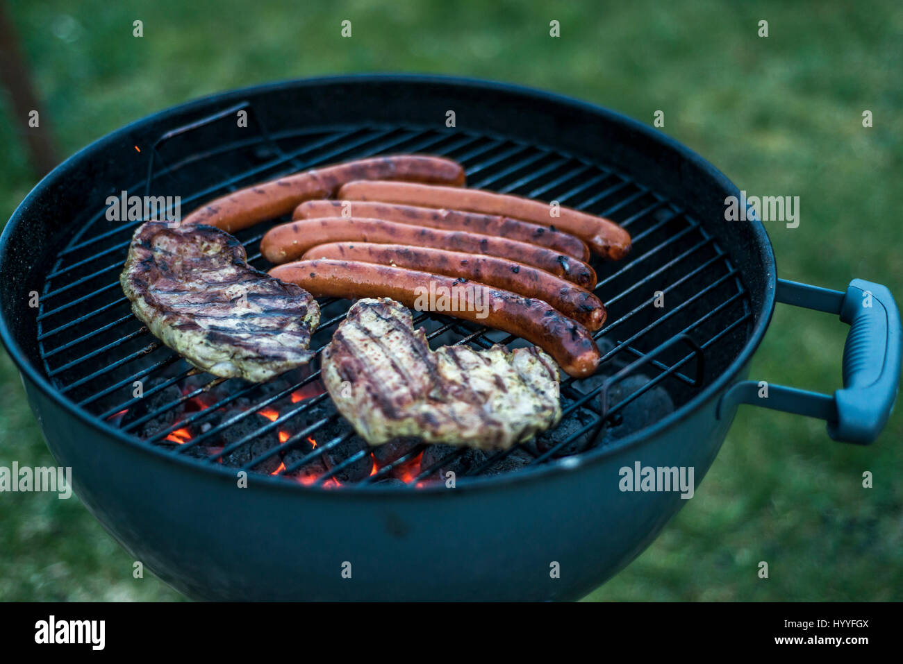 tasty delicious grilled meat over coal on barbecue grill bbq Stock ...