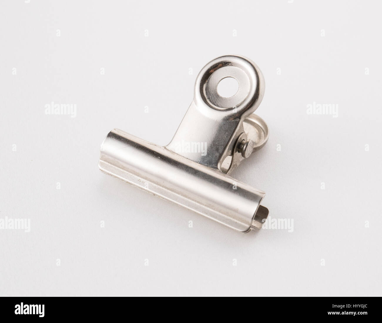 A metal paperclip on a white background Stock Photo - Alamy