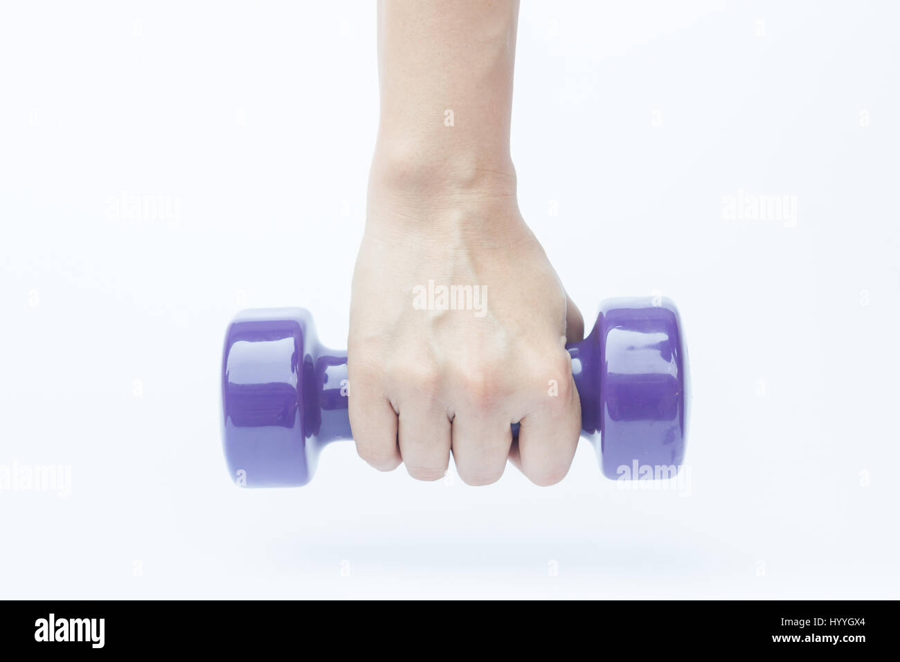 Woman hand holding dumbbell weight isolated on white background, stock ...
