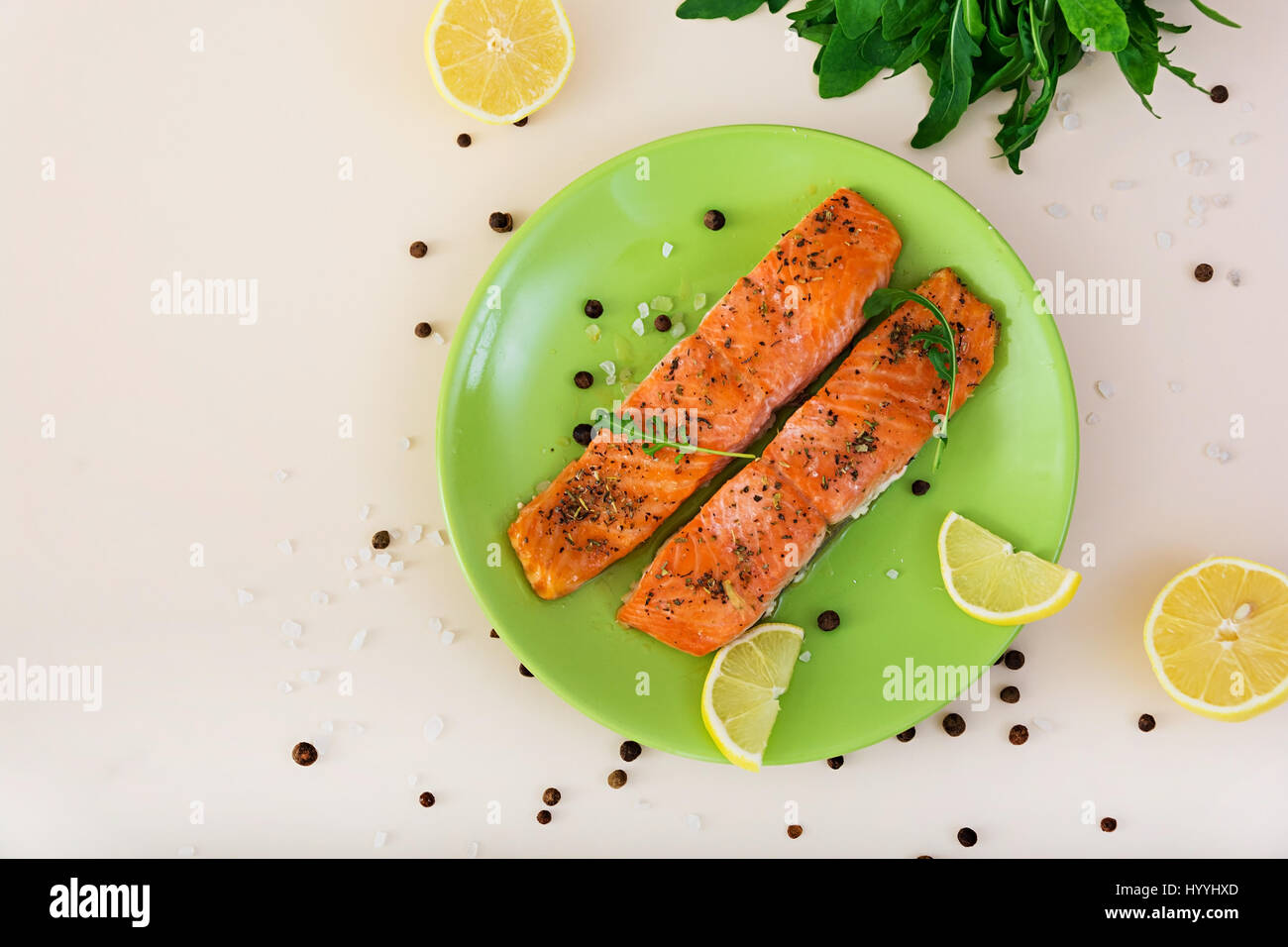 Baked salmon with spices. Top view Stock Photo - Alamy