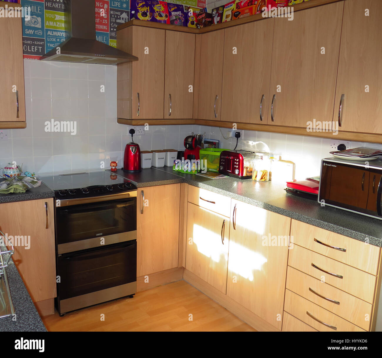 View of typical small domestic kitchen Stock Photo - Alamy