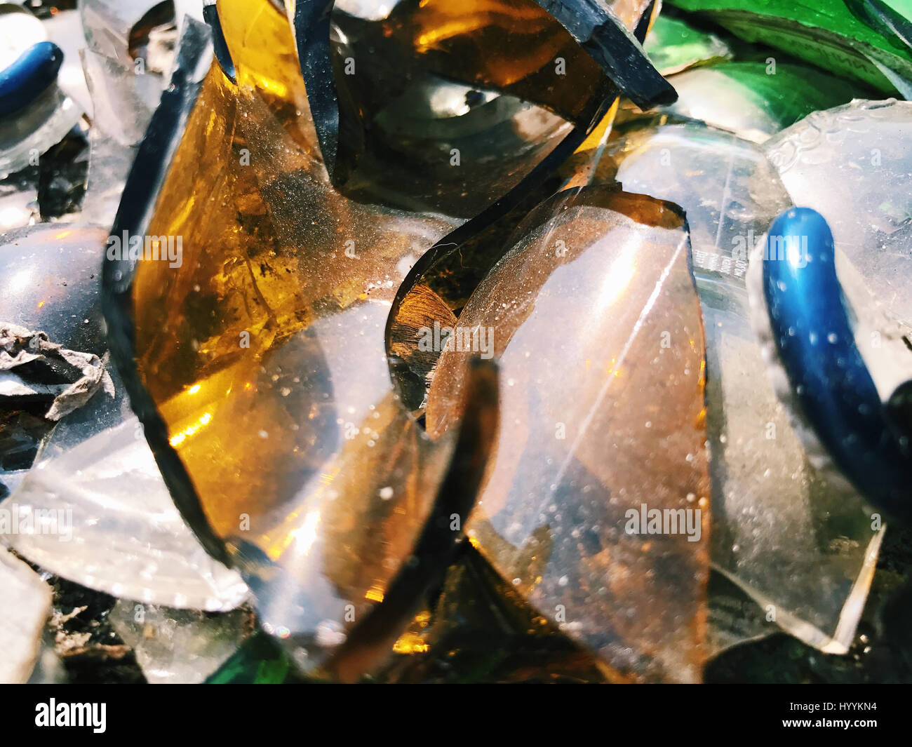 A lot of broken color bottle. Glass background Stock Photo - Alamy