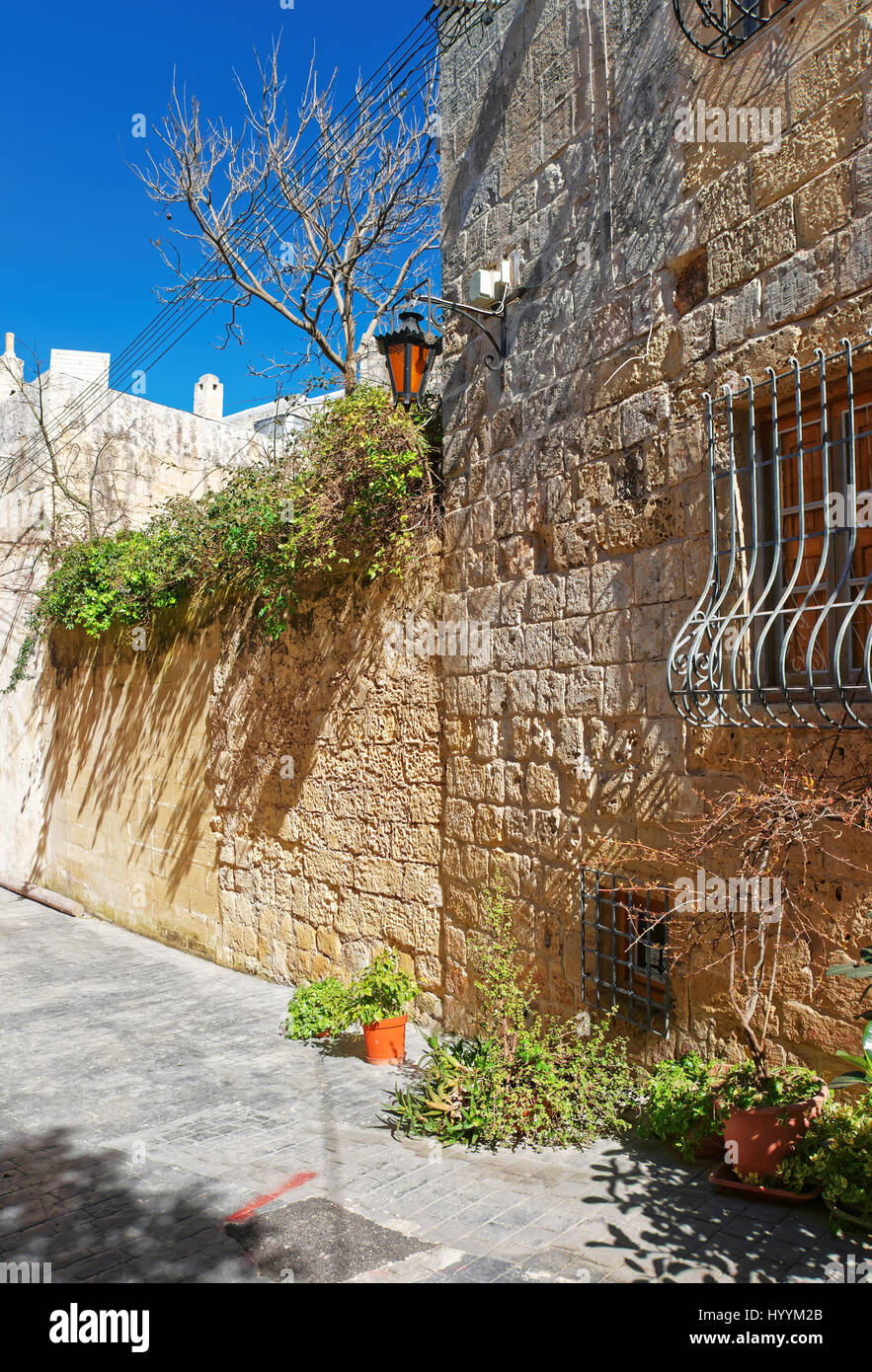 Street decorated with flowers in pots in Rabat, Malta Stock Photo - Alamy