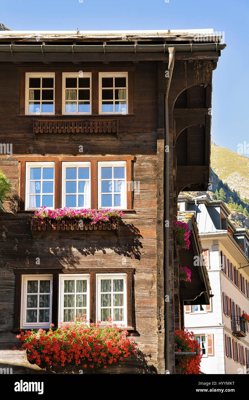 Traditional swiss chalet flowers balconies hi-res stock photography and ...